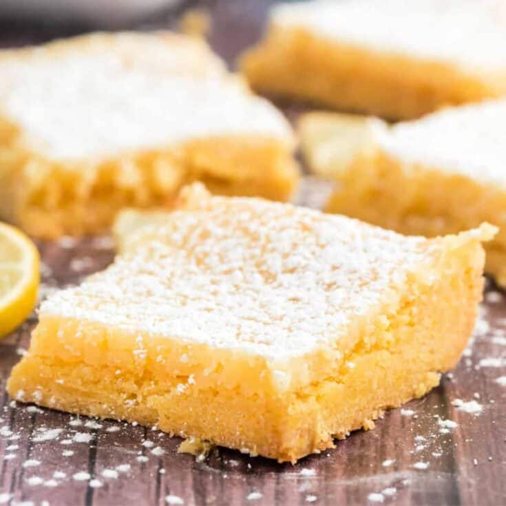 Gooey Lemon Cake Bars Recipe - Shugary Sweets